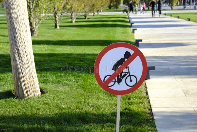 The Bicycle Prohibited Sign on the Wood Pole at the Entrance of the ...