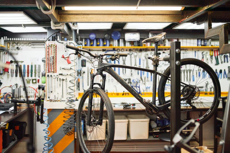 Bicycle on Rack in Workshop Editorial Photo - Image of improve, rack ...
