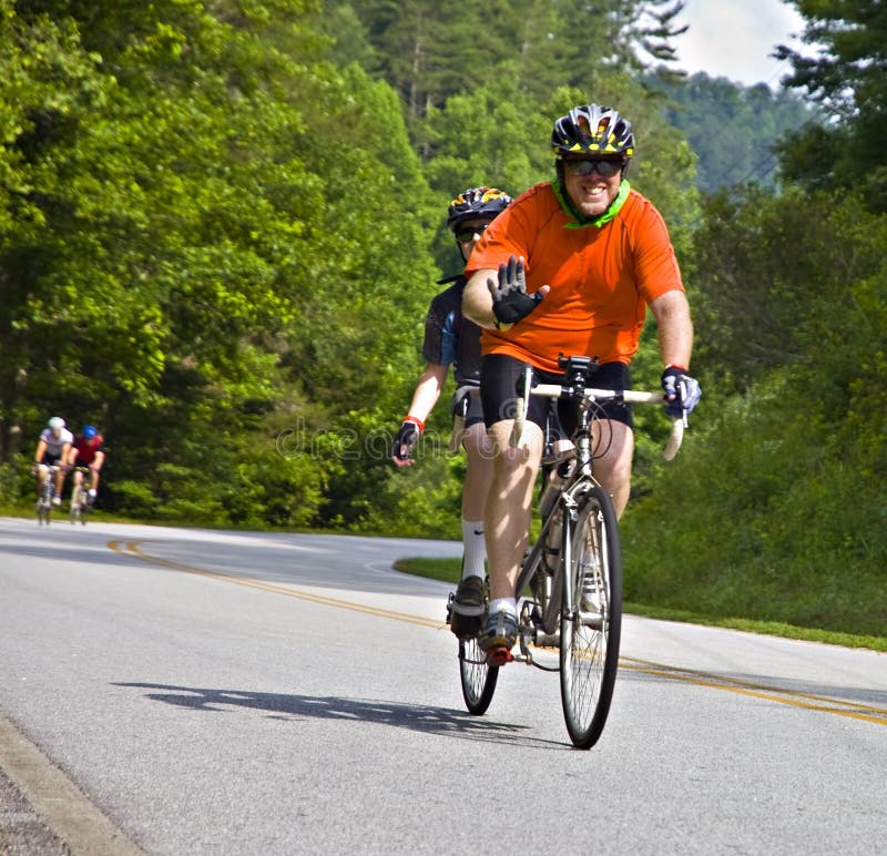 Bicycle Riders on a Mountain Road Editorial Stock Photo - Image of ...