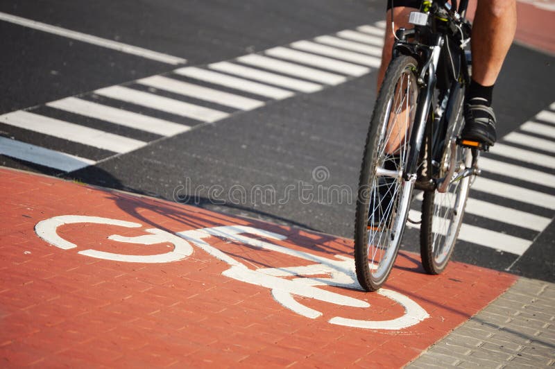 Bicycle Road Sign and Bike Rider Stock Photo - Image of city, rider ...