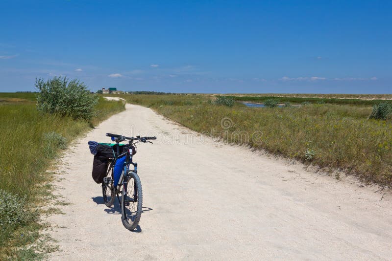 Bicycle on a rural road stock image. Image of travel - 25583921