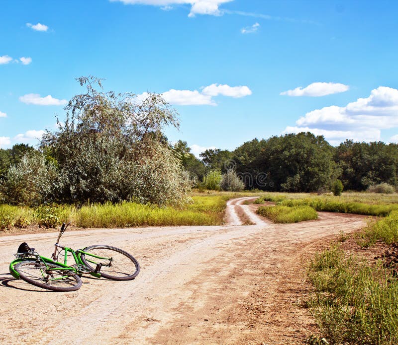 Bicycle on rural road stock photo. Image of choice, rural - 44215420