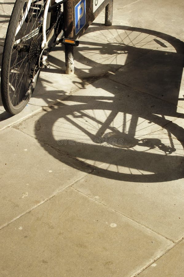 Bicycle shadow stock image. Image of gear, shape, pavement - 56512457