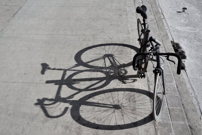 Bicycle shadow stock photo. Image of street, bike, bicycle - 66678342