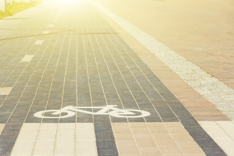 Bicycle Sign on a Bikeway Marked with Lines and Dashed Lane Separator ...
