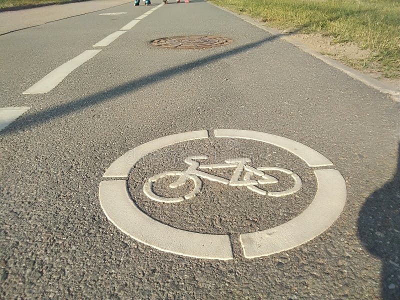Bicycle Sign on a Red Bike Path in Europe Stock Image - Image of ...