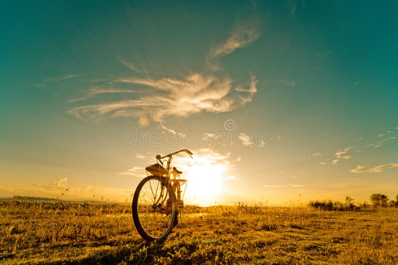 Bicycle at the Sunset or Sunrise Stock Image - Image of sunrise, sport ...