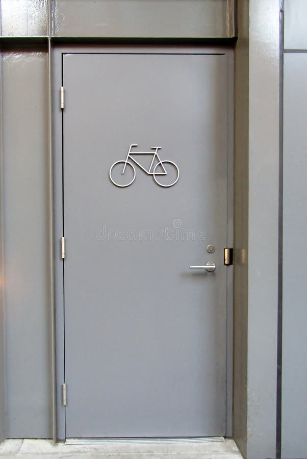 Bicycle storage room door stock photo. Image of protection - 129470484