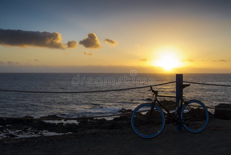 Bicycle Sunset Cliff Ocean. Stock Image - Image of freedom, work: 72811337