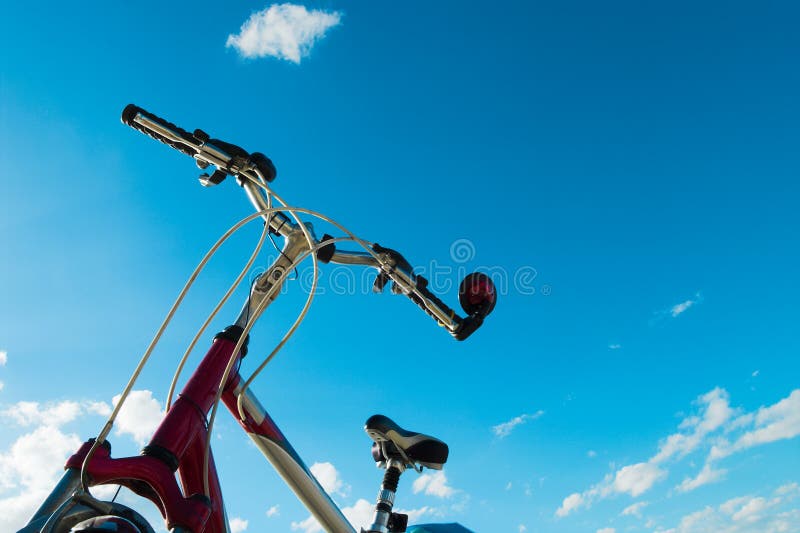 Bicycle Upper Part with Handlebar and Frame Against the Blue Sky. Stock ...