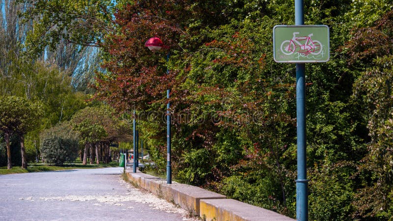 Bicycle Use Sign in the Park Stock Photo - Image of roadway ...