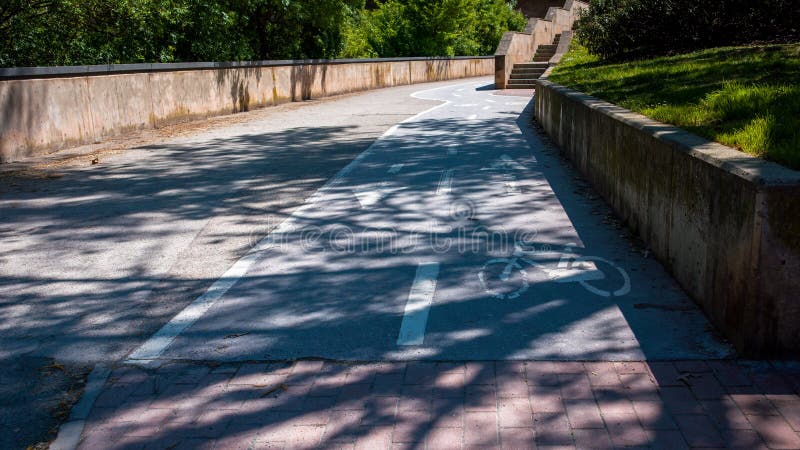 Bicycle Use Sign on the Pavement Lane Stock Photo - Image of ...