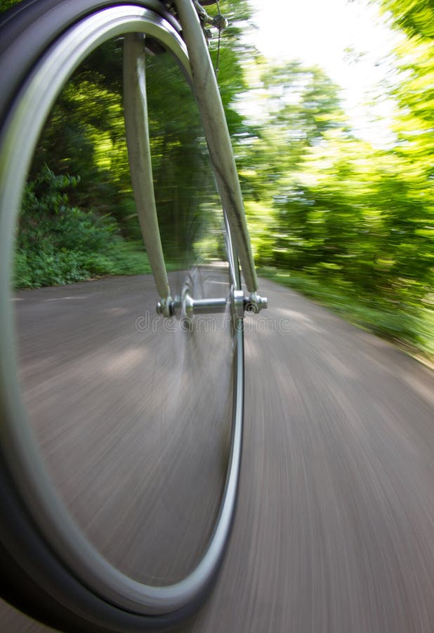 Bicycle wheel in motion stock image. Image of biking - 30216237