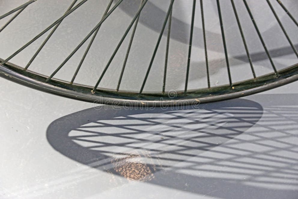 Bicycle wheel and shadow stock image. Image of biking - 227080003