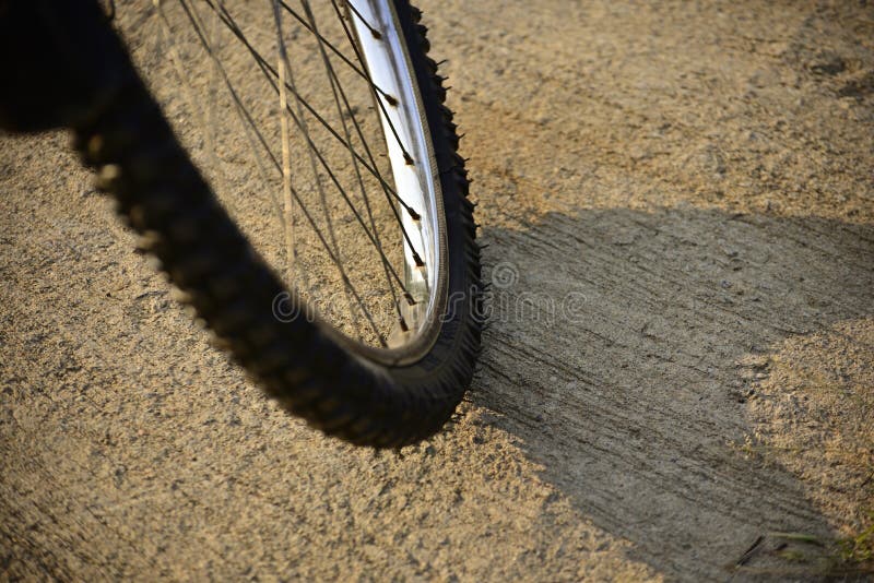 Bicycle wheel and shadow stock photo. Image of mode - 200017476