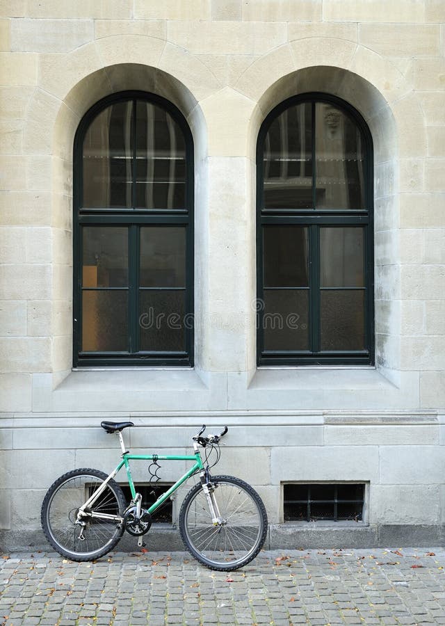 Bicycle and windows stock photo. Image of chain, brick - 11512956