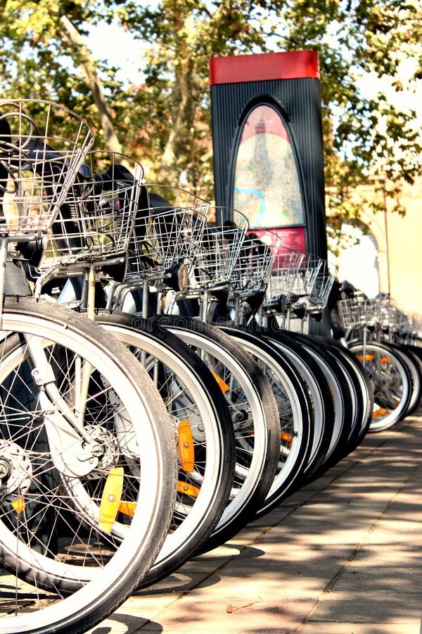 Bicycles line in the city stock photo. Image of transport - 190526340