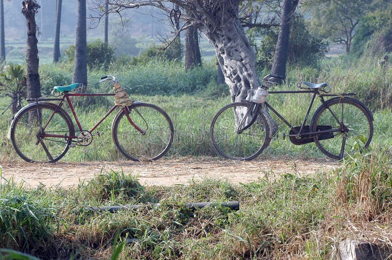 Bicycles in countryside stock photo. Image of propped - 7713612