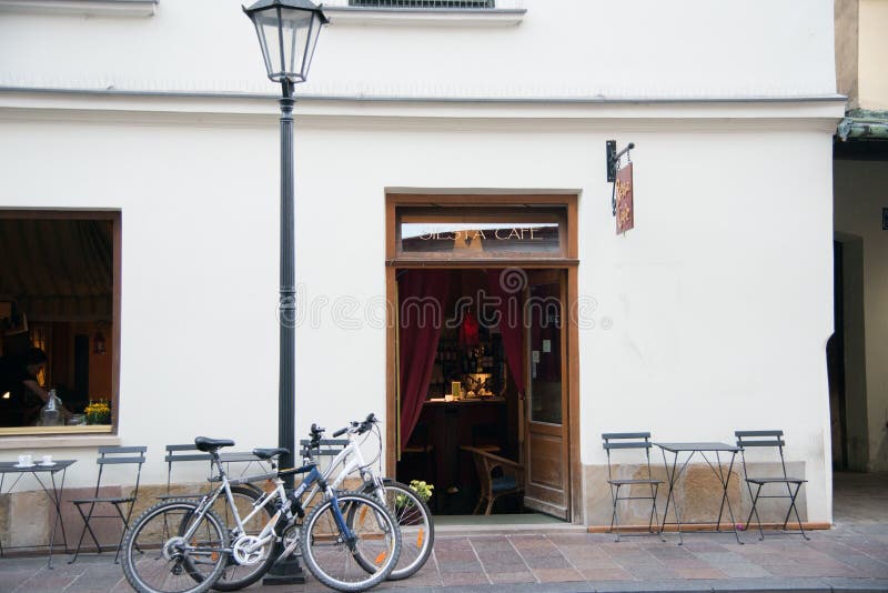 Bicycles Parked beside a Light Post in Front of a Building in Krakow ...