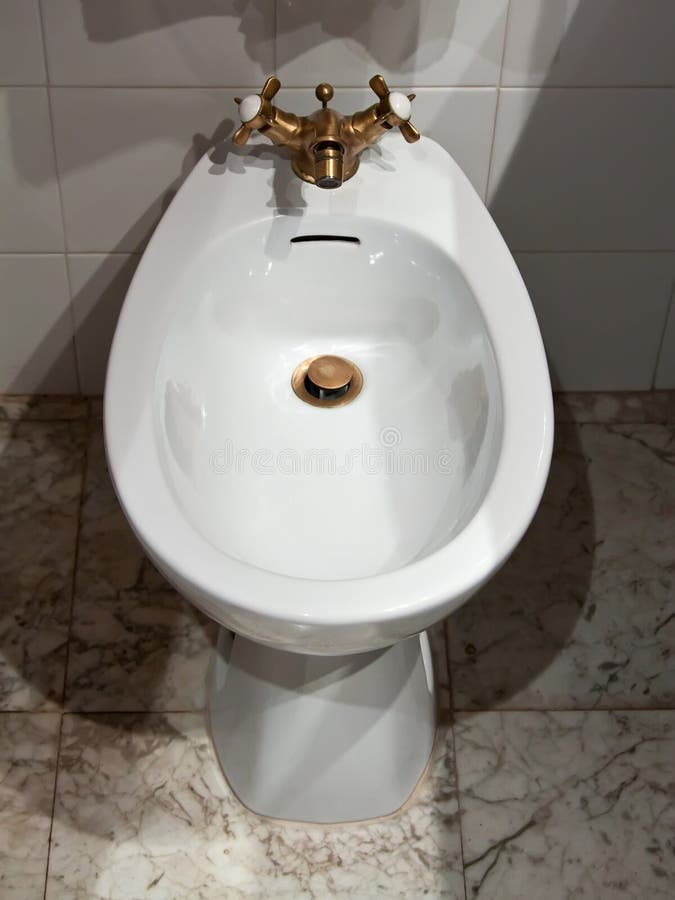 Golden toilet and bidet stock image. Image of hotel, clean - 29903611