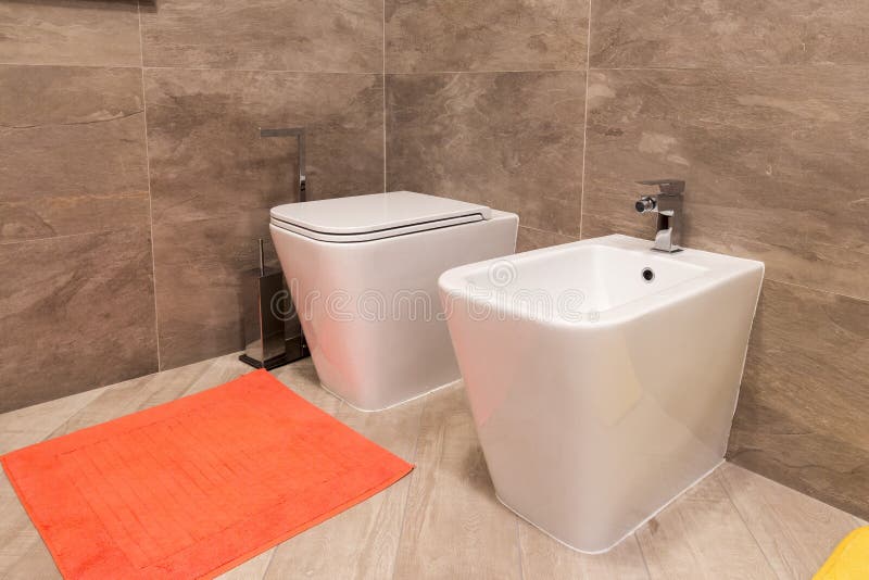 Close Up of Bidet and Wc in the Bathroom Stock Photo - Image of resin ...