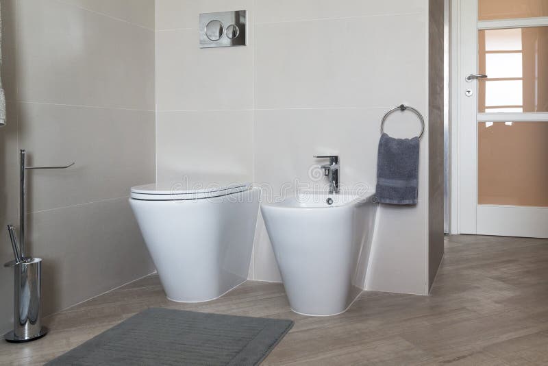 Close Up of Bidet and Wc in the Bathroom Stock Photo - Image of resin ...