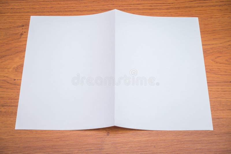 .Bifold White Template Paper on Wood Texture Stock Photo - Image of ...