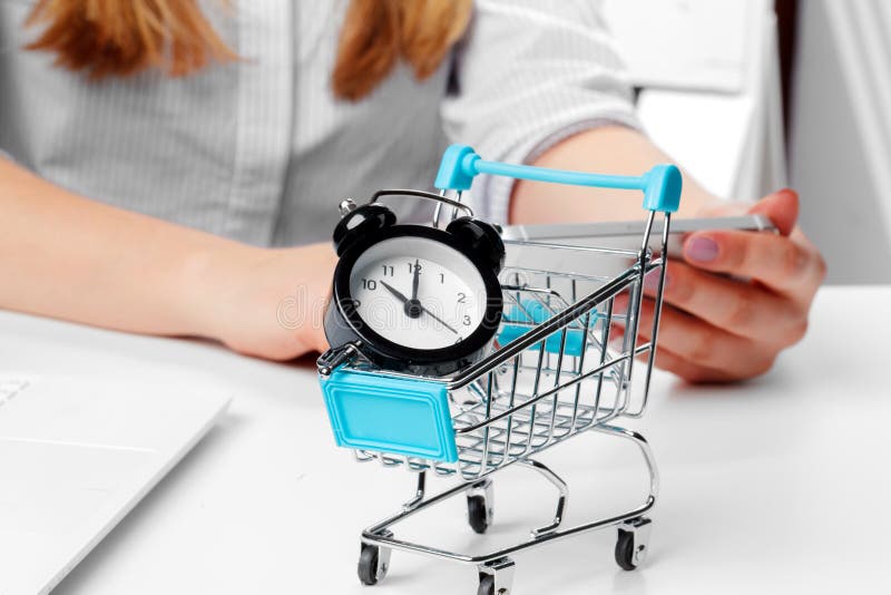 Big Alarm Clock in Shopping Cart on a Table Stock Image - Image of ...