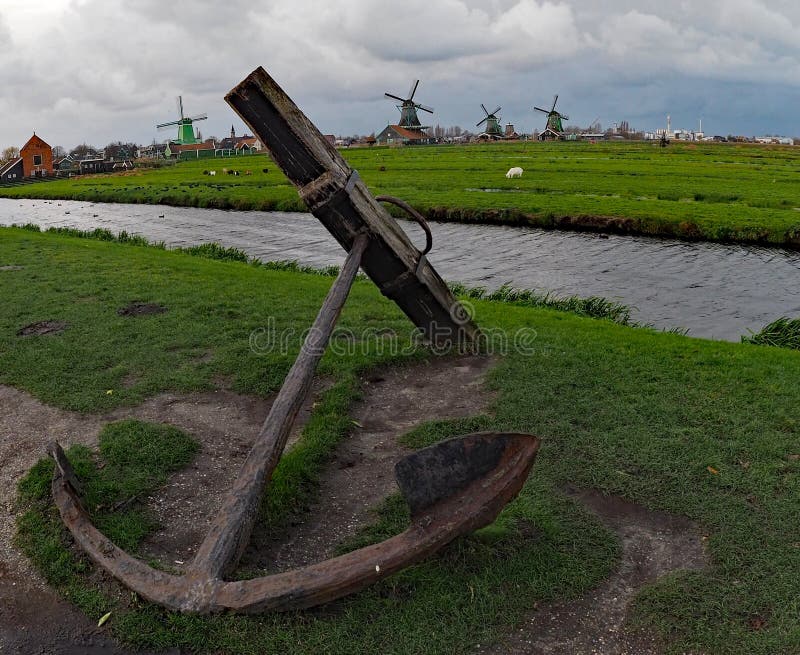 Big Anchor in the Foreground and Windmills in the Background Stock ...