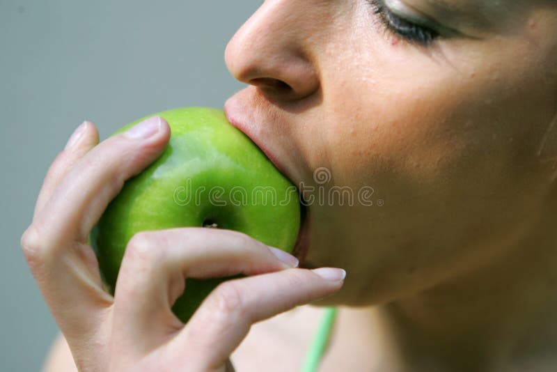 Big apple bite stock image. Image of close, lips, picking - 846631