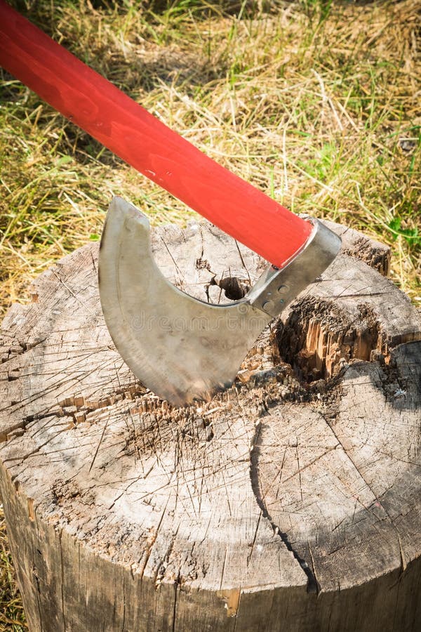 The big axe cuts a tree stock photo. Image of logger - 138449722