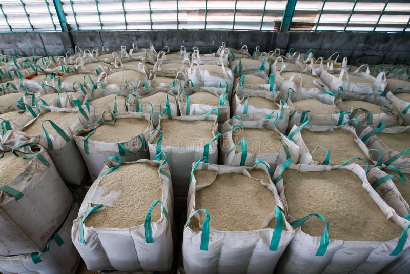 Rice in bag from warehouse stock image. Image of metal - 35639353