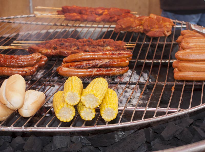 Big Barbecue with Meal, Bread, Corn and Wiener Stock Photo - Image of ...