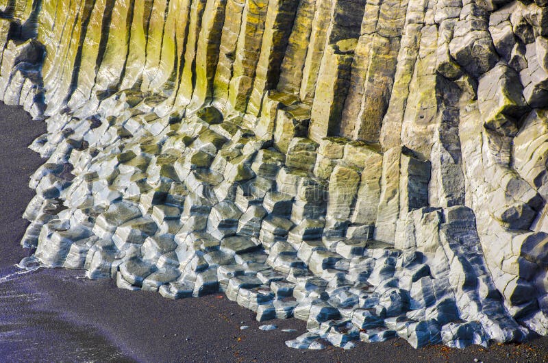 Big Basalt Rocks with Yellow and Blue Moss on the Beach Stock Photo ...