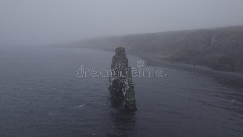 Big Basalt Stack Resembling a Drinking Dragon in the Middle of the Sea ...