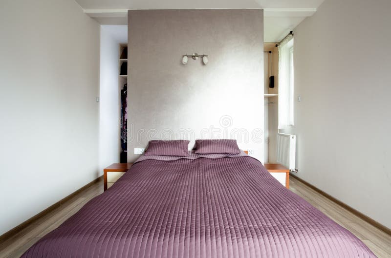 Big bed in a bedroom stock image. Image of cupboard, comfort - 49720471