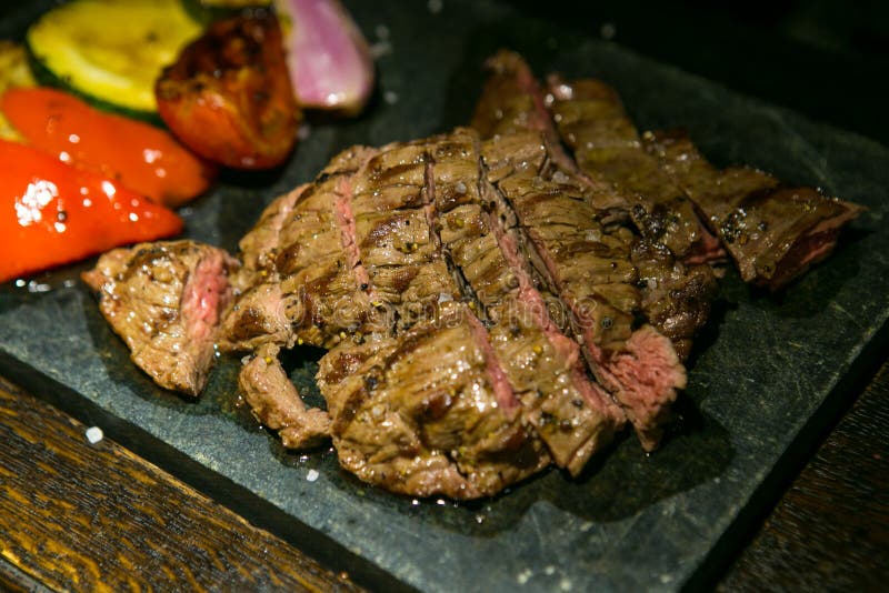 Big beef steak medium rare stock image. Image of sauce - 74698303