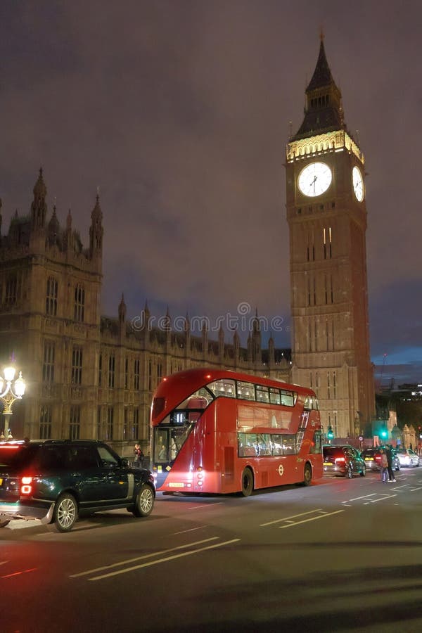 Big Ben with London Red Double Decker Bus at Night Editorial ...