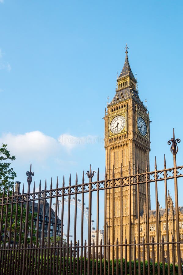 Big Ben Tower in London Behind Fences with Blue Sky Stock Photo - Image ...