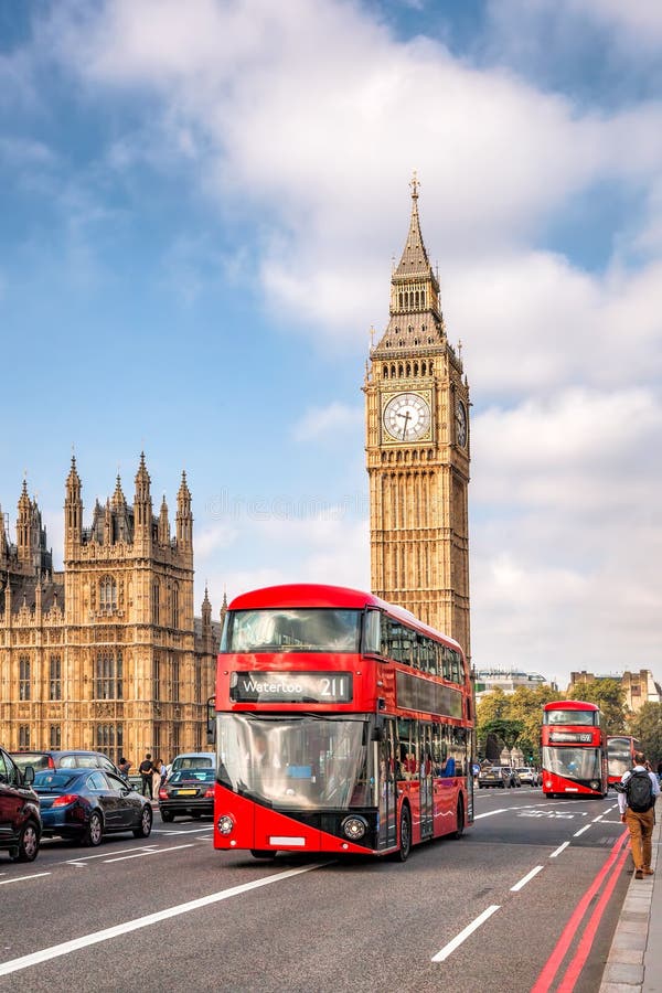 Big Ben with Typical Red Buses on the Bridge in London, England, UK ...