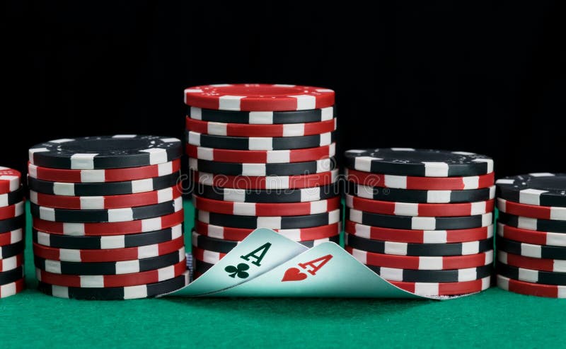 Big Bet on the Green Table and Two Poker Playing Cards Stock Photo ...