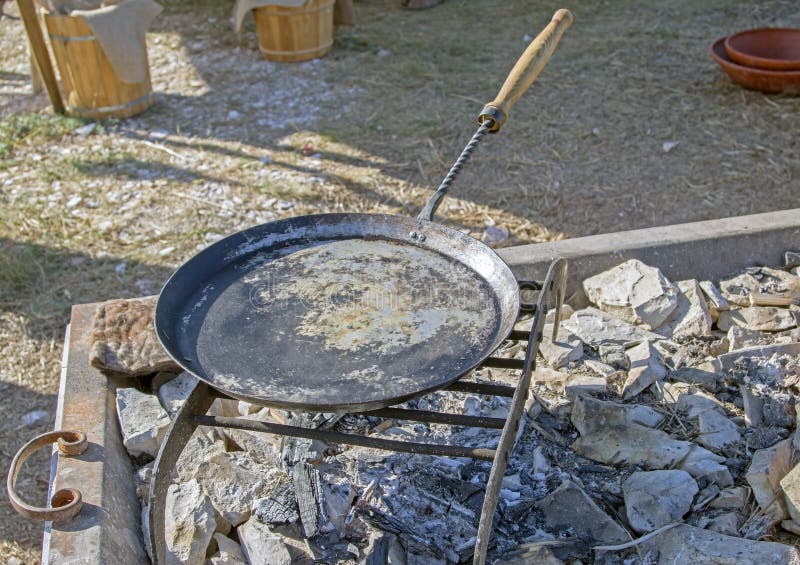 Big Black Frying Pan on the Grate Stock Image - Image of bucket, black ...