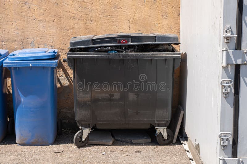 Big Black Garbage Container Stock Photo - Image of dumpster, litter ...