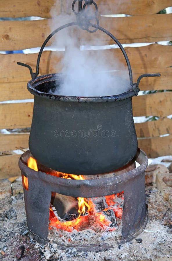 Big Black Pot with the Fire Lit and the Dense White Smoke Stock Photo ...