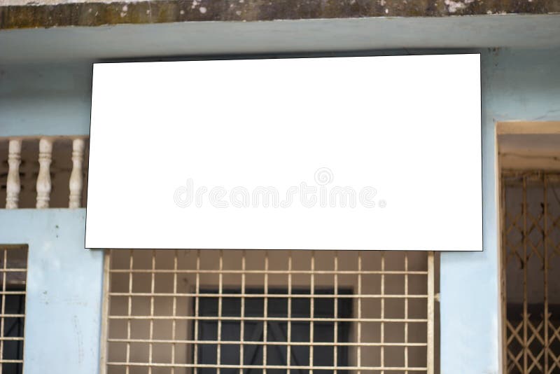 A Big Blank White Photo Frame on the Wall on the Roadside and ...