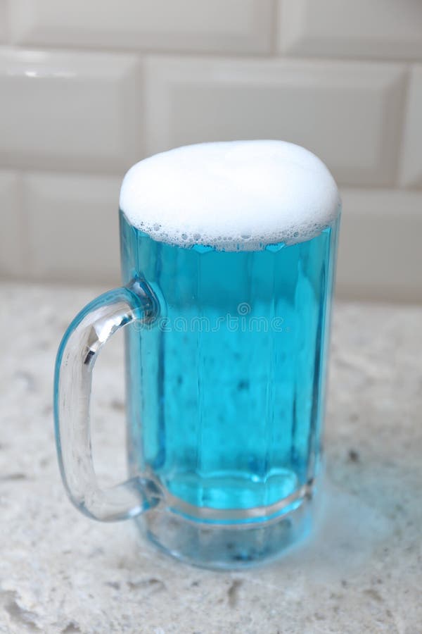Big Blue Beer stock photo. Image of blue, concept, froth - 104952208