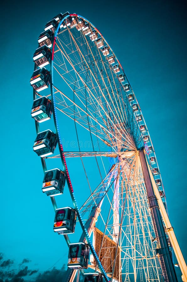 Big Blue Carousel Ferris Wheel Fairground Stock Photo - Image of family ...
