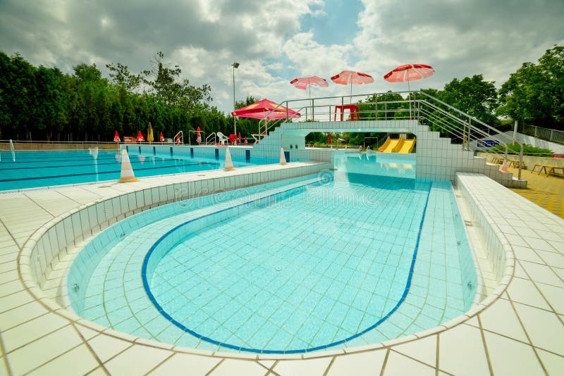 A Big Blue Public Swimming Pool in Nature Stock Photo - Image of ...