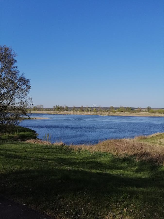 Big blue river stock photo. Image of pond, horizon, lake - 180012206
