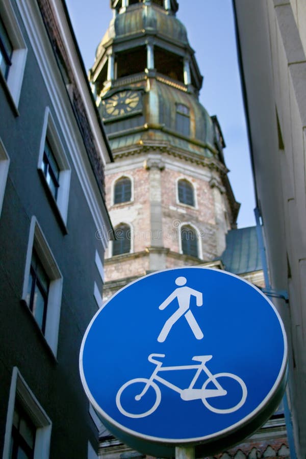 Big Blue Road Sign and Basilica Stock Photo - Image of outdoors, houses ...